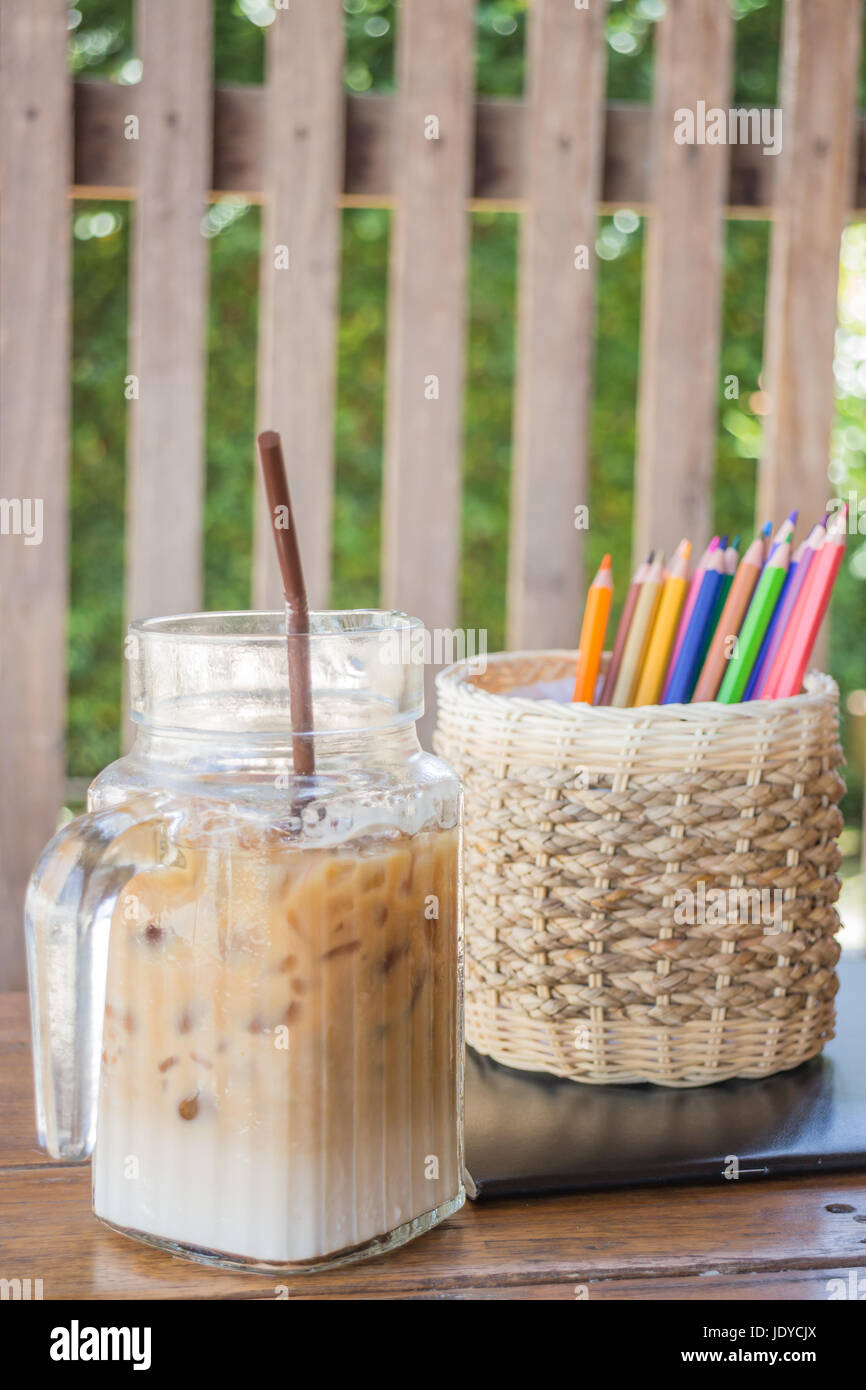 Freelance artist work station at coffee shop Stock Photo - Alamy