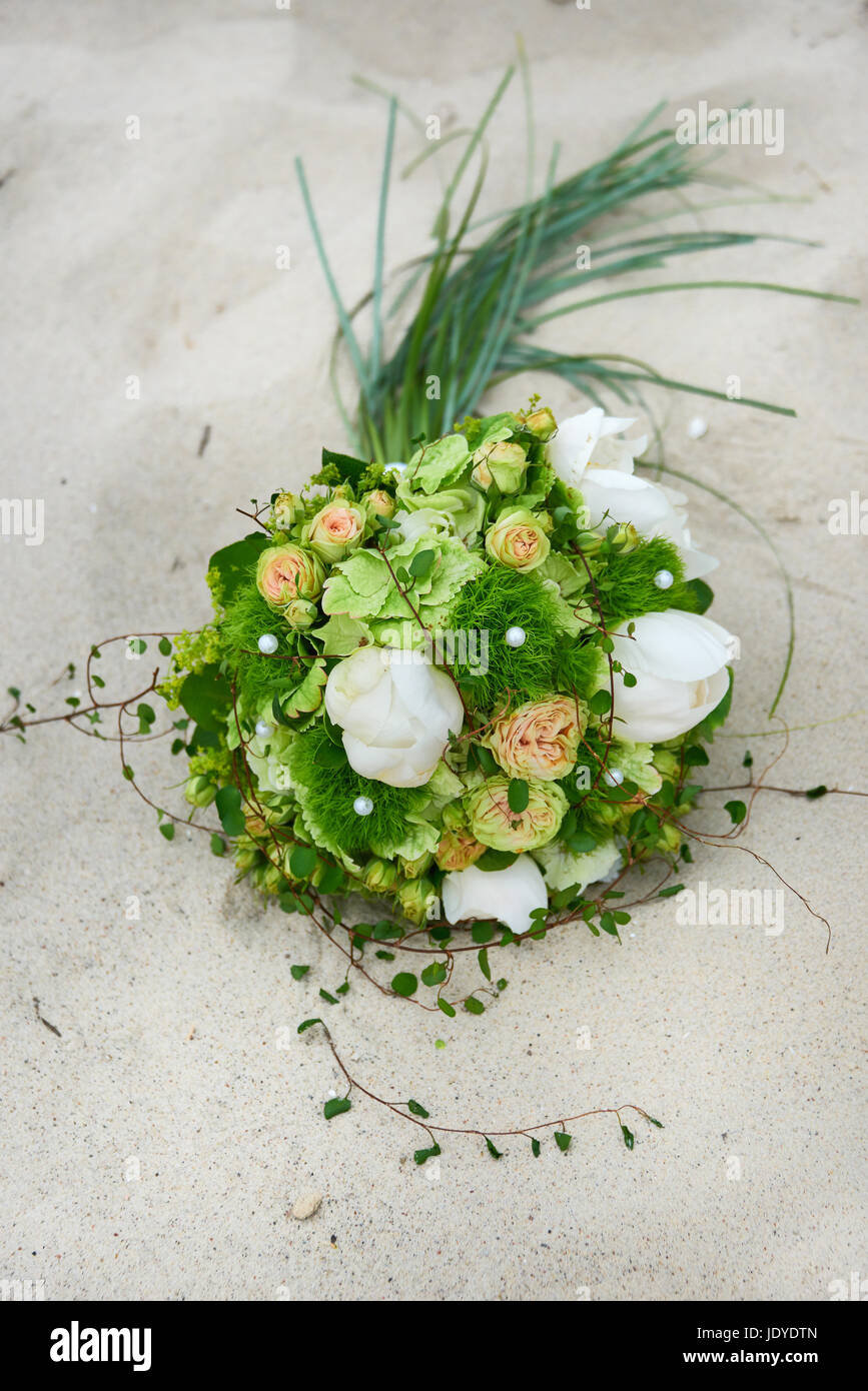 a bouquet of flowers on beach Stock Photo - Alamy