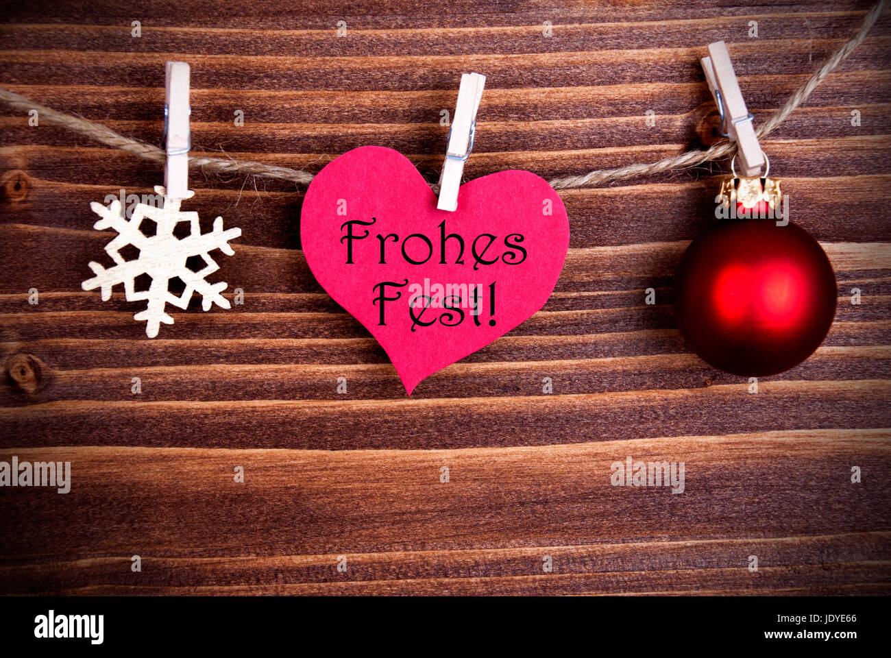 The German Words Frohes Fest, which means Merry Christmas, in a Heart ...