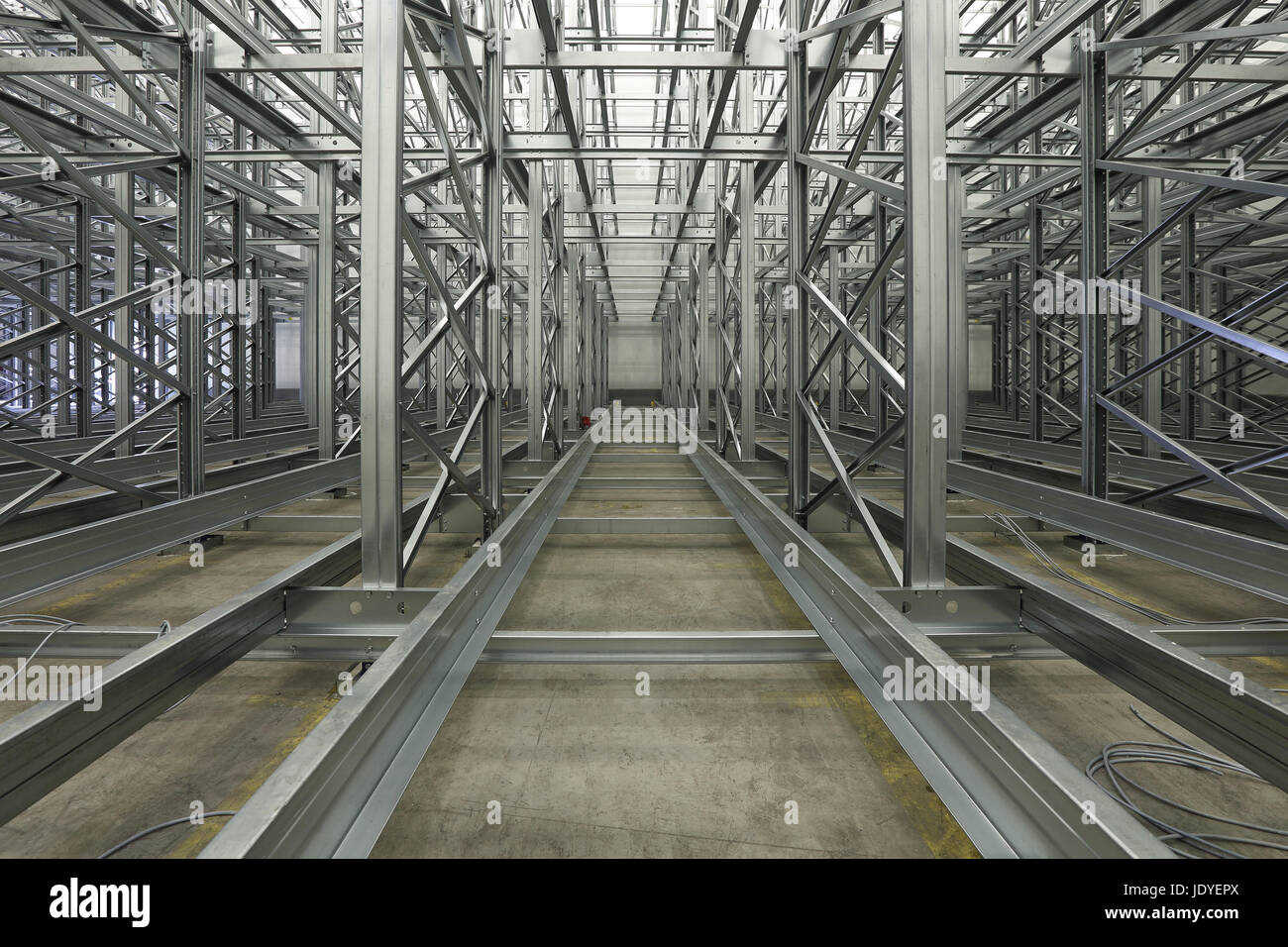 Shelving system rails in automated warehouse Stock Photo - Alamy