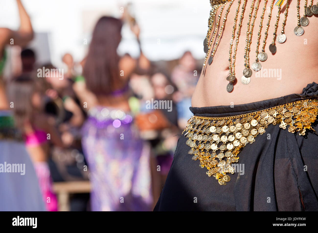 Belly dancers detail dancing with arabic music street band at the ...