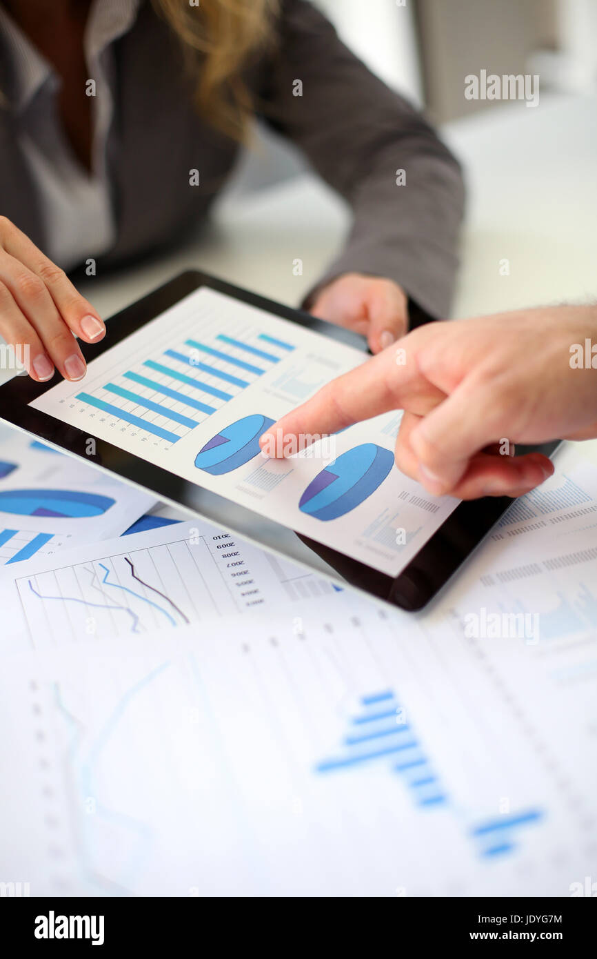 Business plan presentation on digital tablet Stock Photo - Alamy
