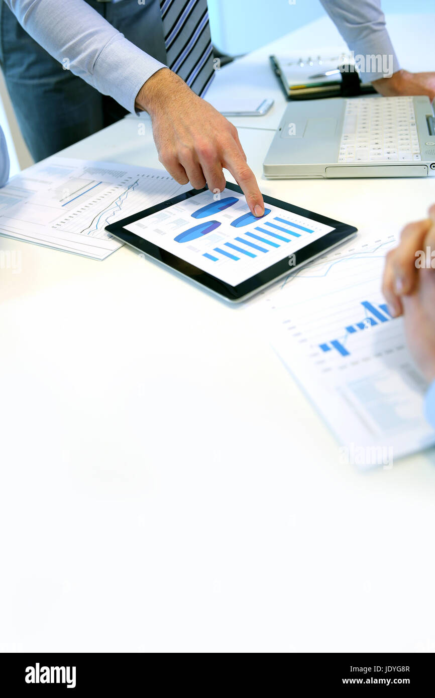Closeup of tablet screen presenting charts Stock Photo - Alamy