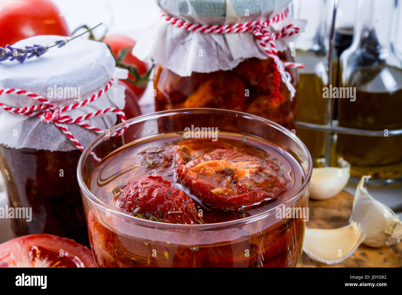 Dried tomatoes in olive oil Stock Photo - Alamy