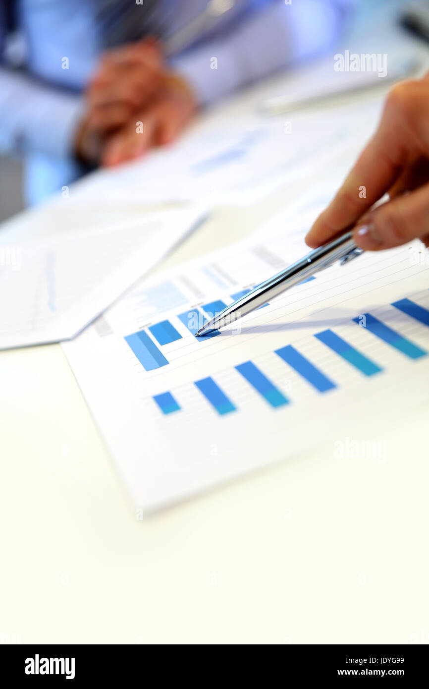 Closeup on business papers set on table Stock Photo - Alamy