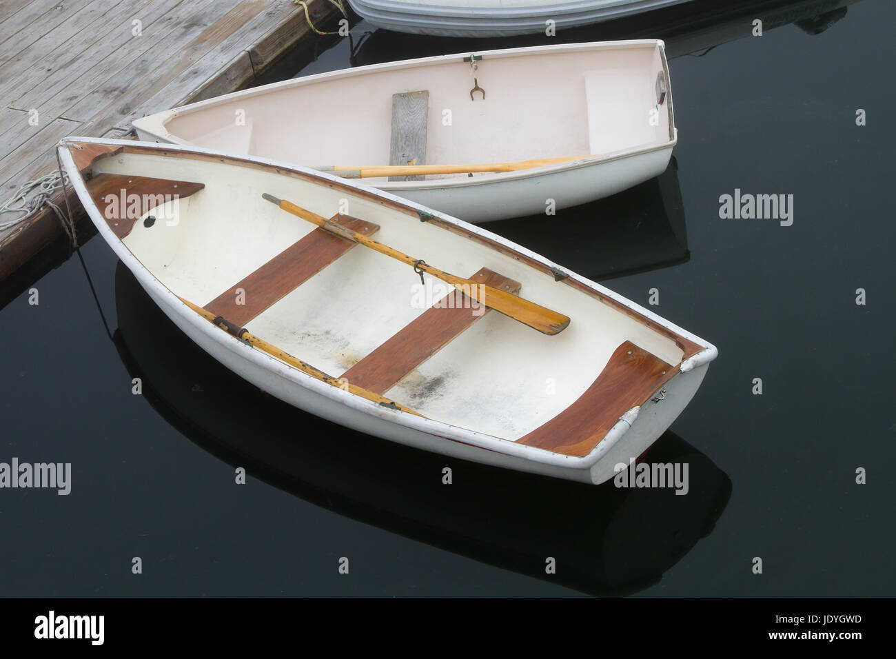 Fishing boat tied to pier hi-res stock photography and images - Alamy