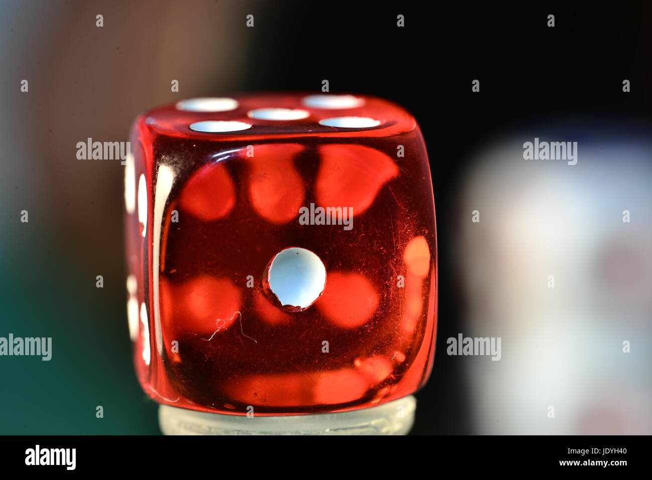 Red dice close up Stock Photo - Alamy