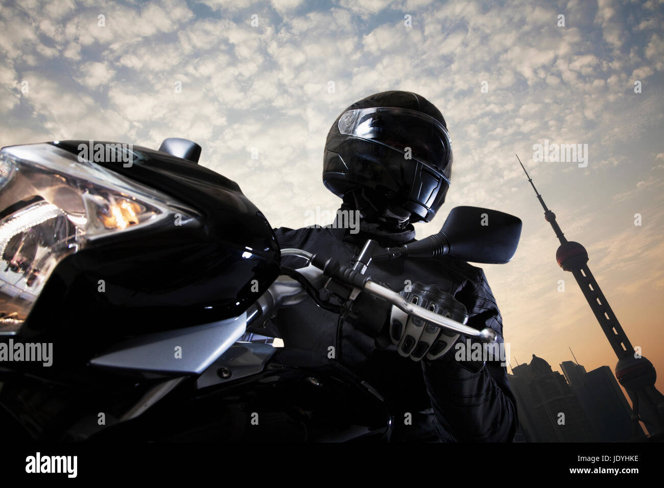 Biker riding motorcycle low angle hi-res stock photography and images ...