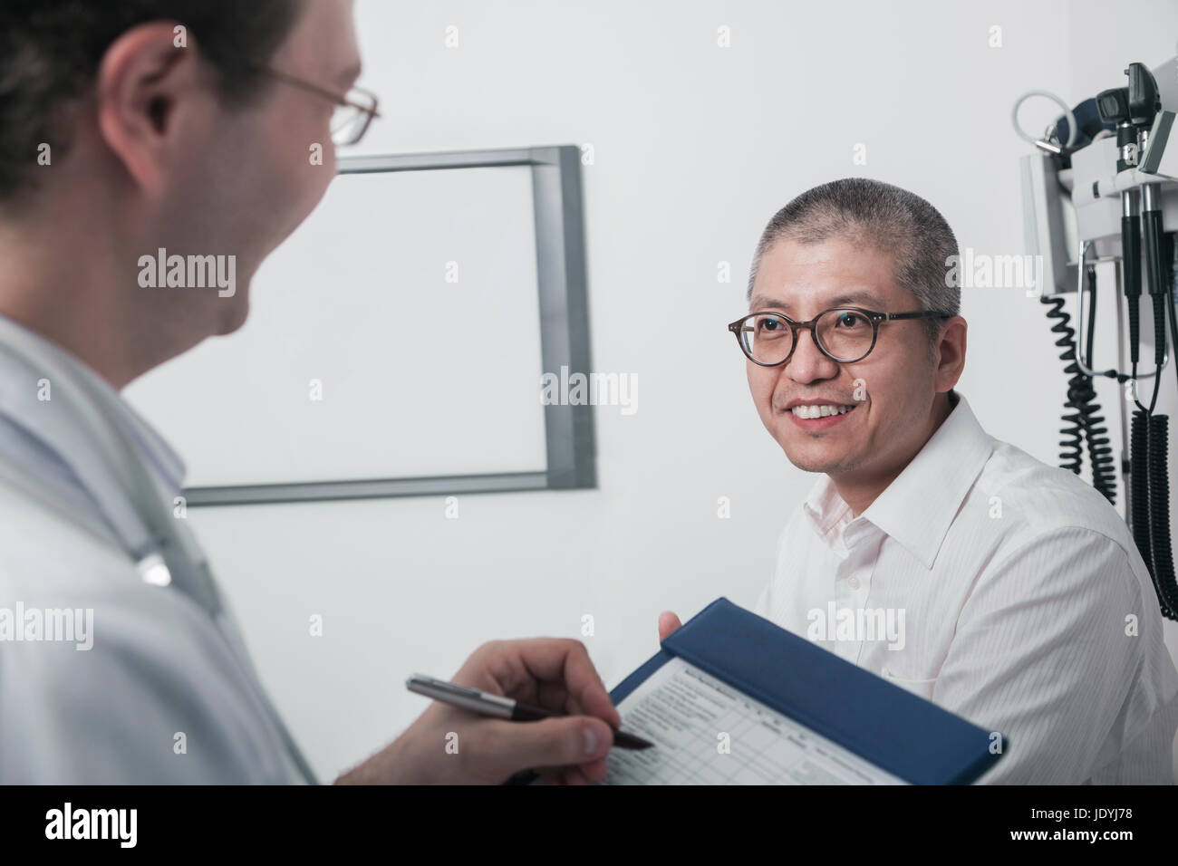 Sitting laughing communication holding authority hi-res stock ...