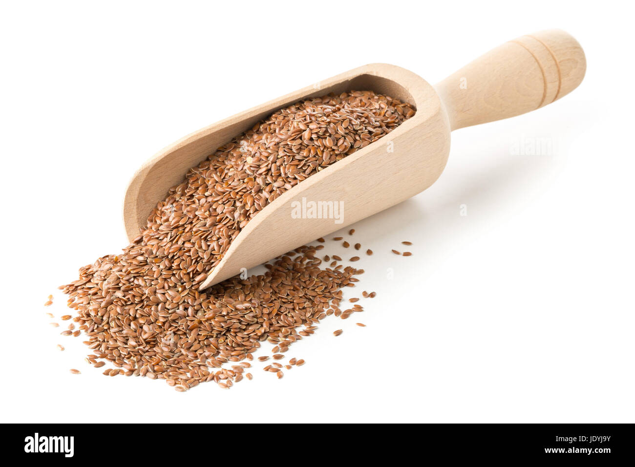 Raw, unprocessed linseed or flax seed in wooden scoop over white background Stock Photo - Alamy