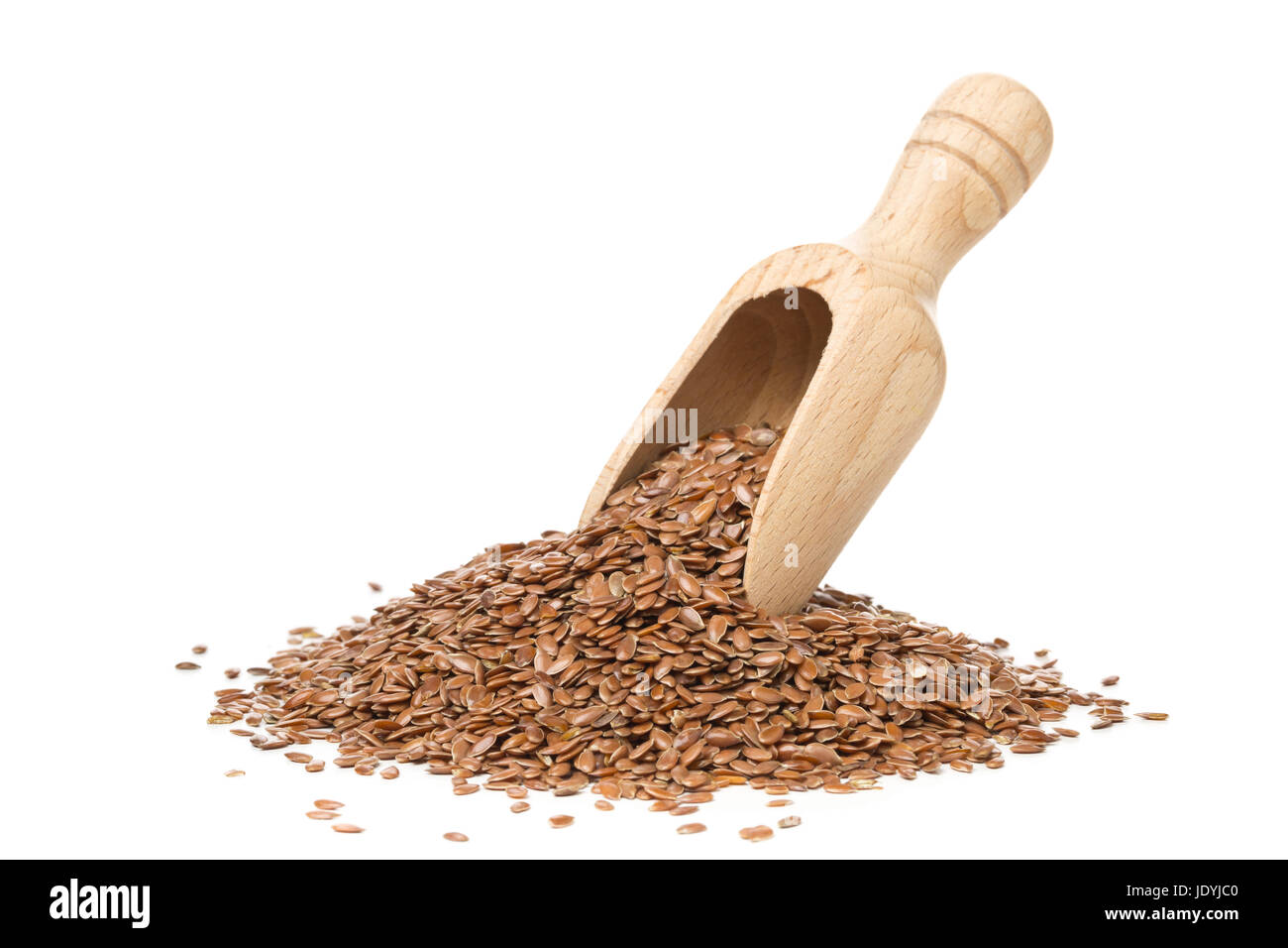 Raw, unprocessed linseed or flax seed in wooden scoop over white background Stock Photo - Alamy