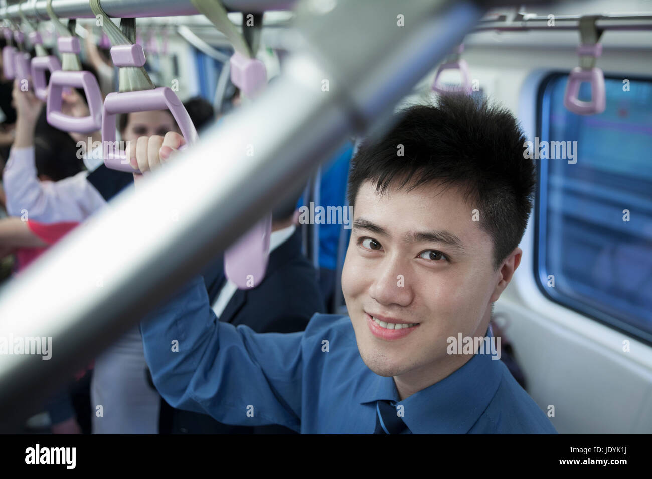 Standing smiling cheerful crowded happiness hi-res stock photography ...