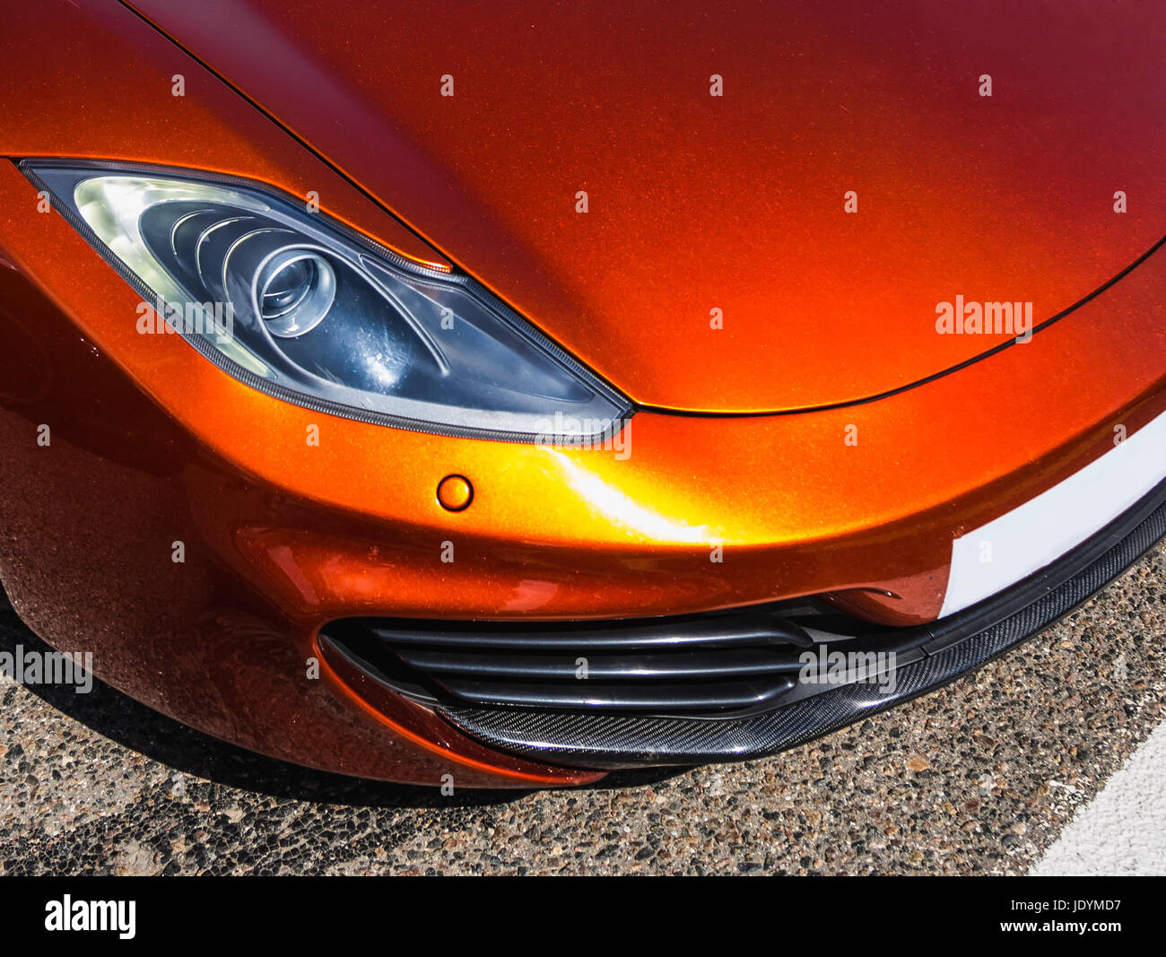 Front light of sport automobile Stock Photo - Alamy