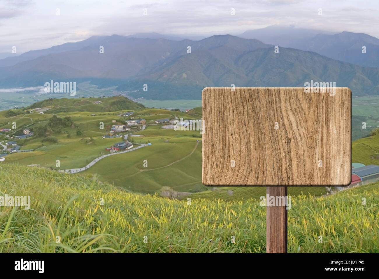Blank wooden sign on field of farm. Concept of rural, idyllic ...