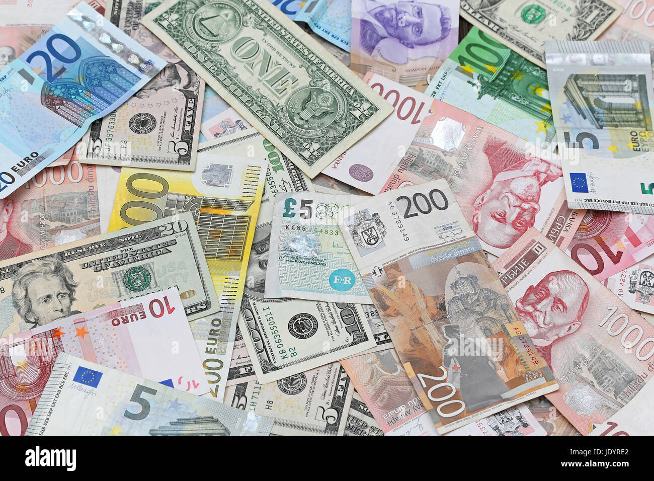 Various paper banknotes mix of money background Stock Photo - Alamy