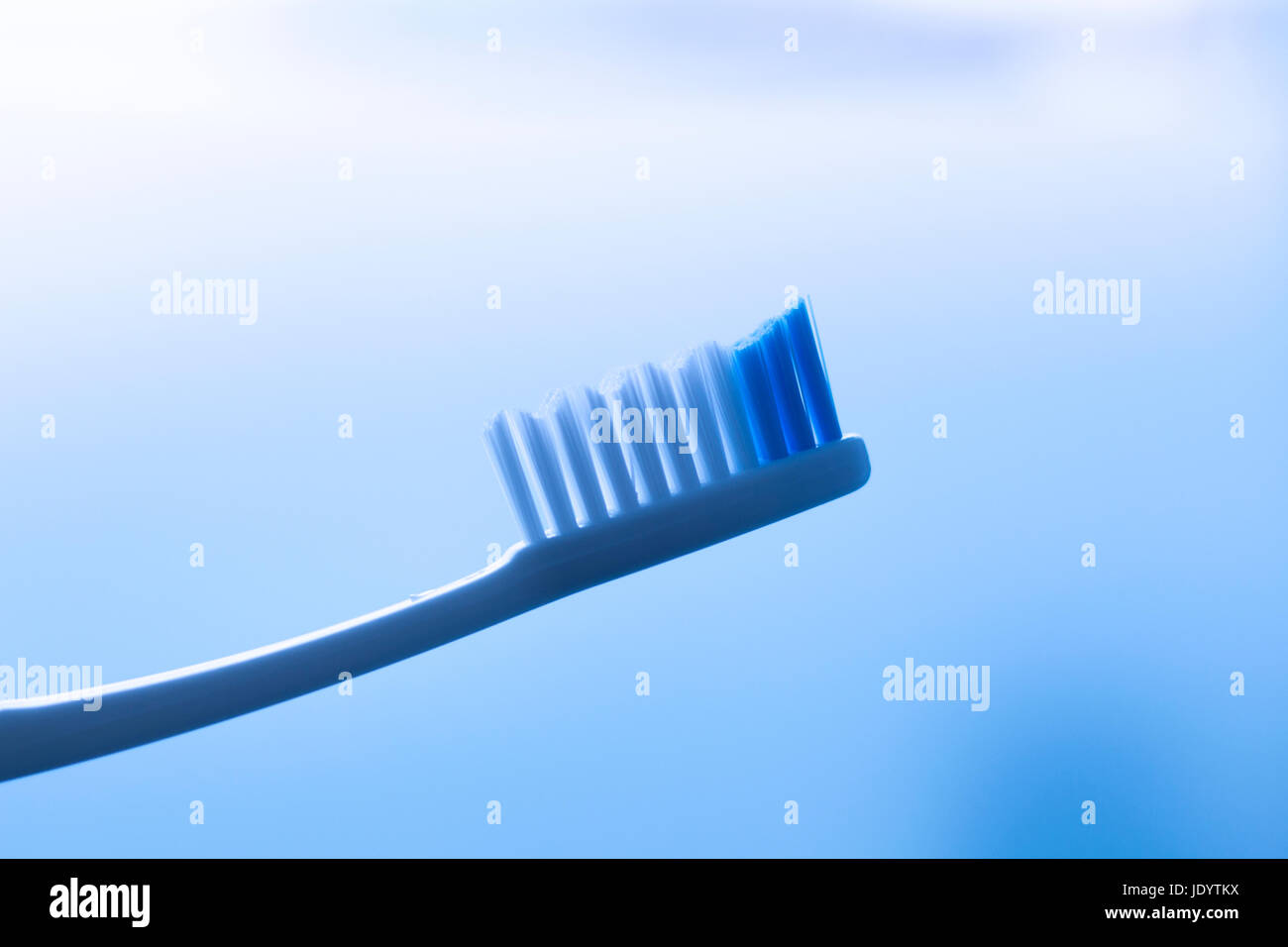 Dental toothbrush to clean teeth isolated in bathroom closeup Stock ...