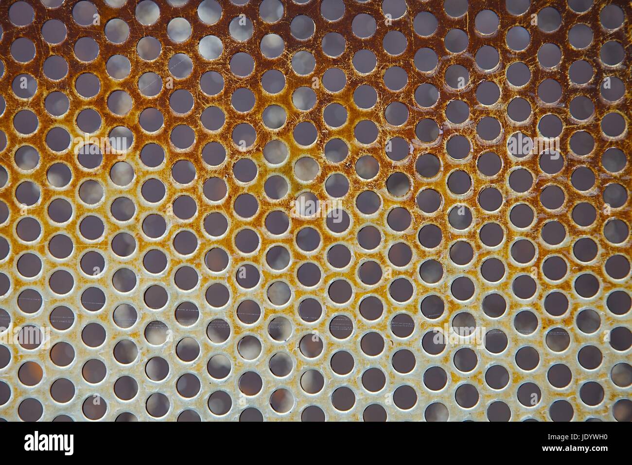 Rusty metal hole mesh pattern Stock Photo - Alamy