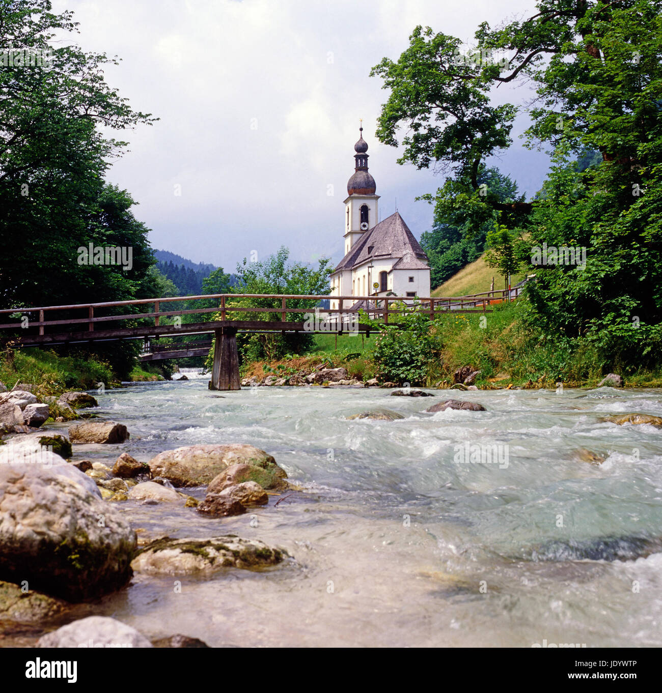 Church with creek and bridge in Ramsau, Germany Stock Photo - Alamy