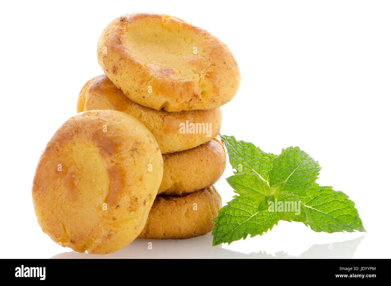 Pile of sweet waffles with green mint leaves isolated on white ...