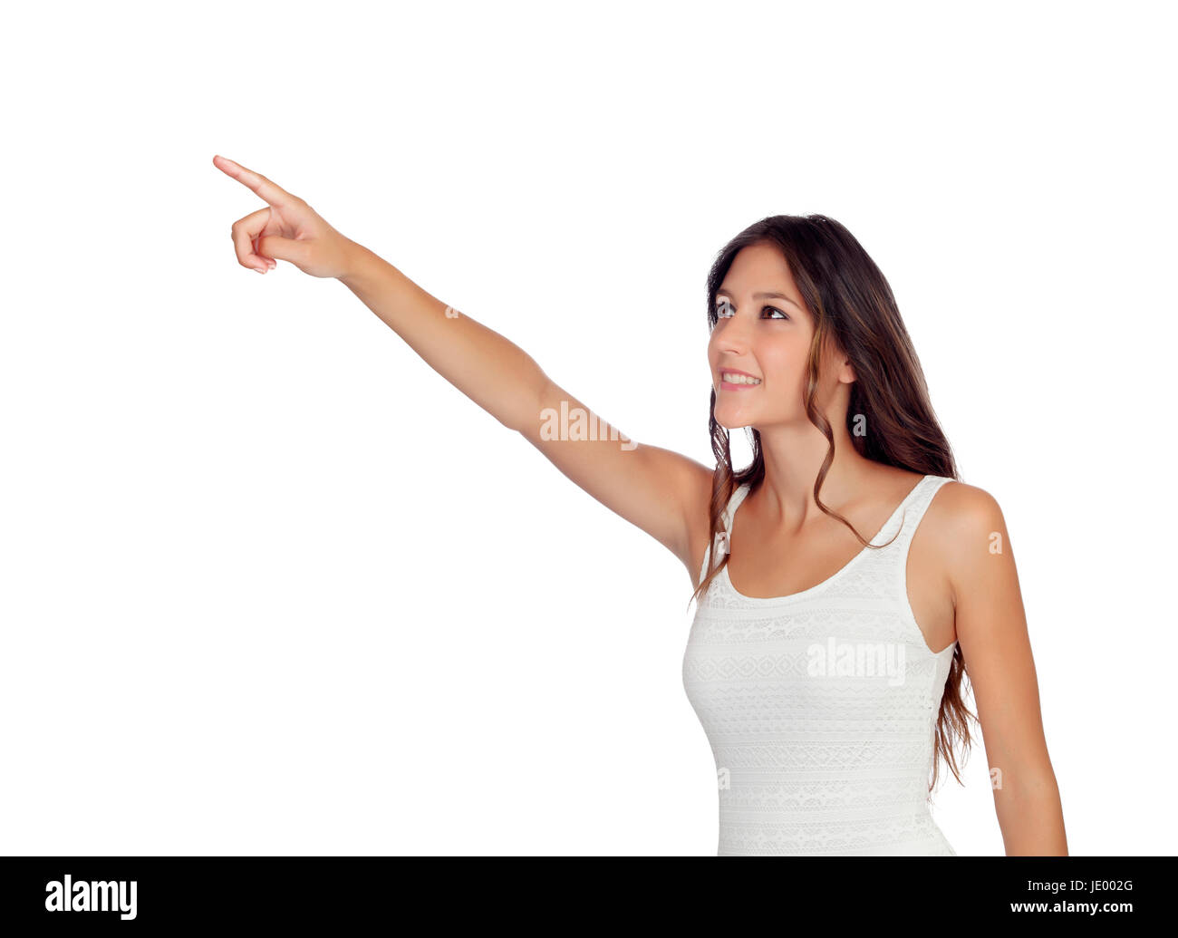 Attractive casual gril pointing something isolated on a white ...