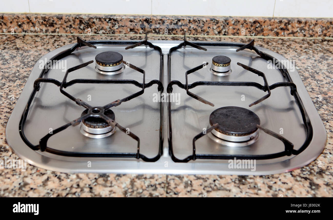 Traditional Kitchen with four-burner butane gas Stock Photo - Alamy