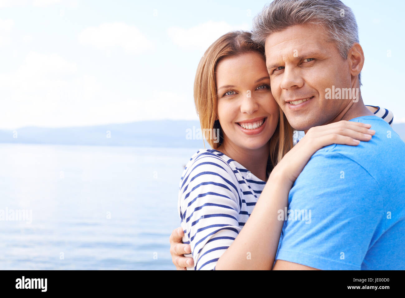 Lovers embracing outdoors Stock Photo - Alamy