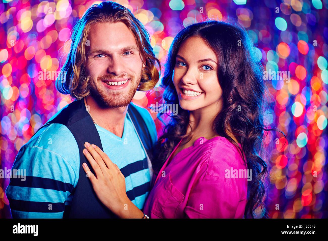 Portrait of a beautiful couple at club Stock Photo - Alamy