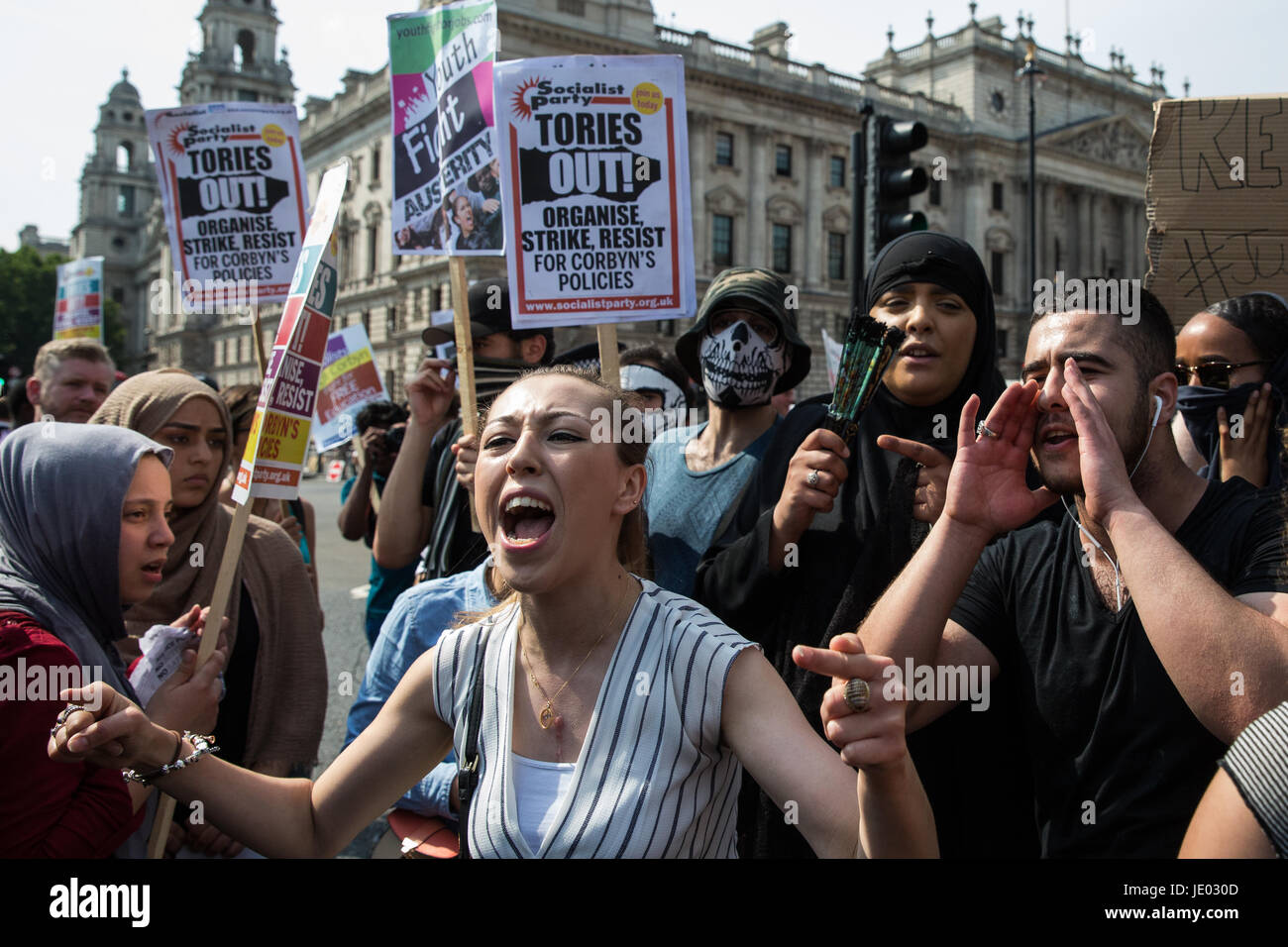 London, UK. 21st June, 2017. Protesters block Westminster Bridge Road ...