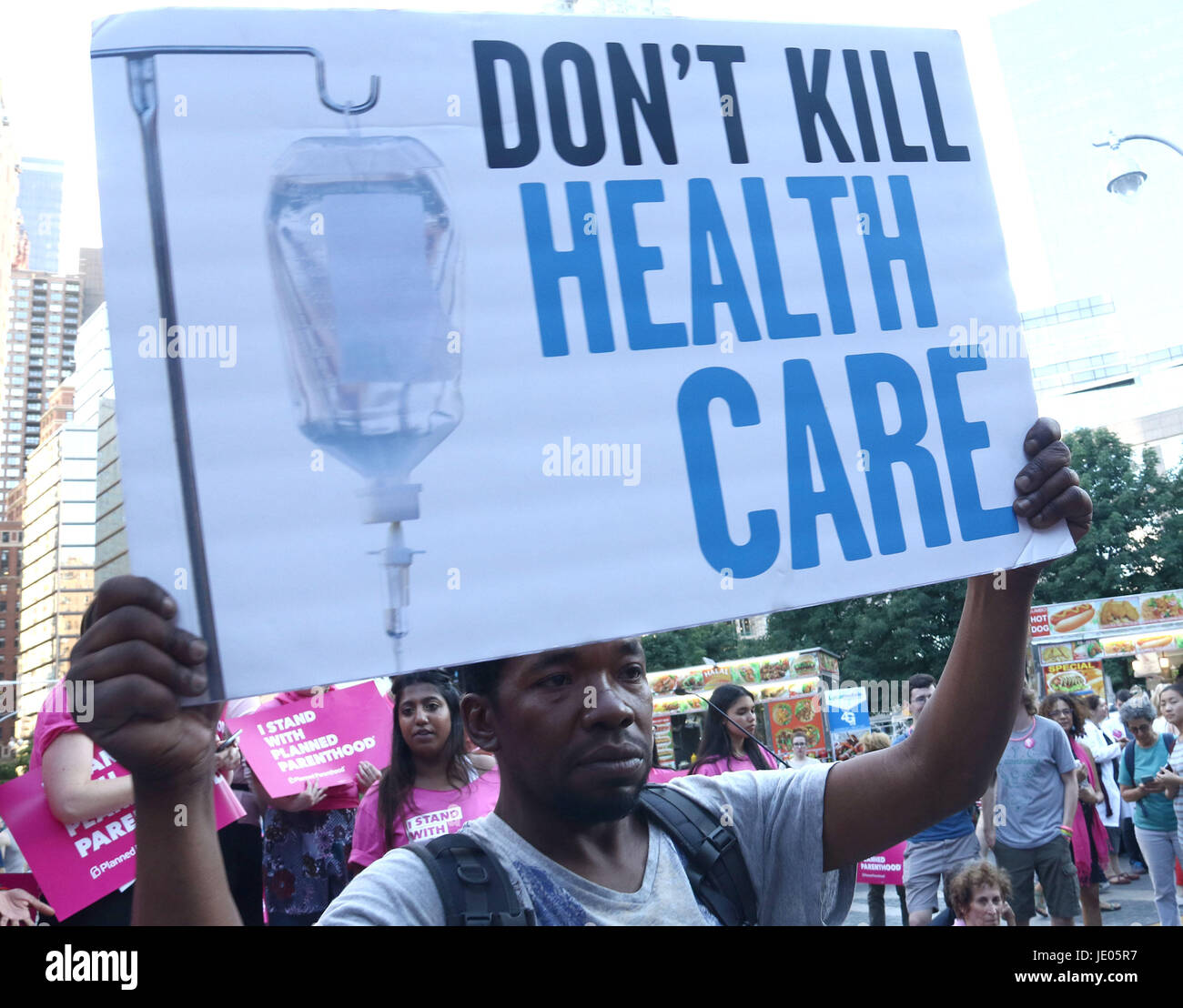 New York, New York, USA. 21st June, 2017. A health care activist holds ...