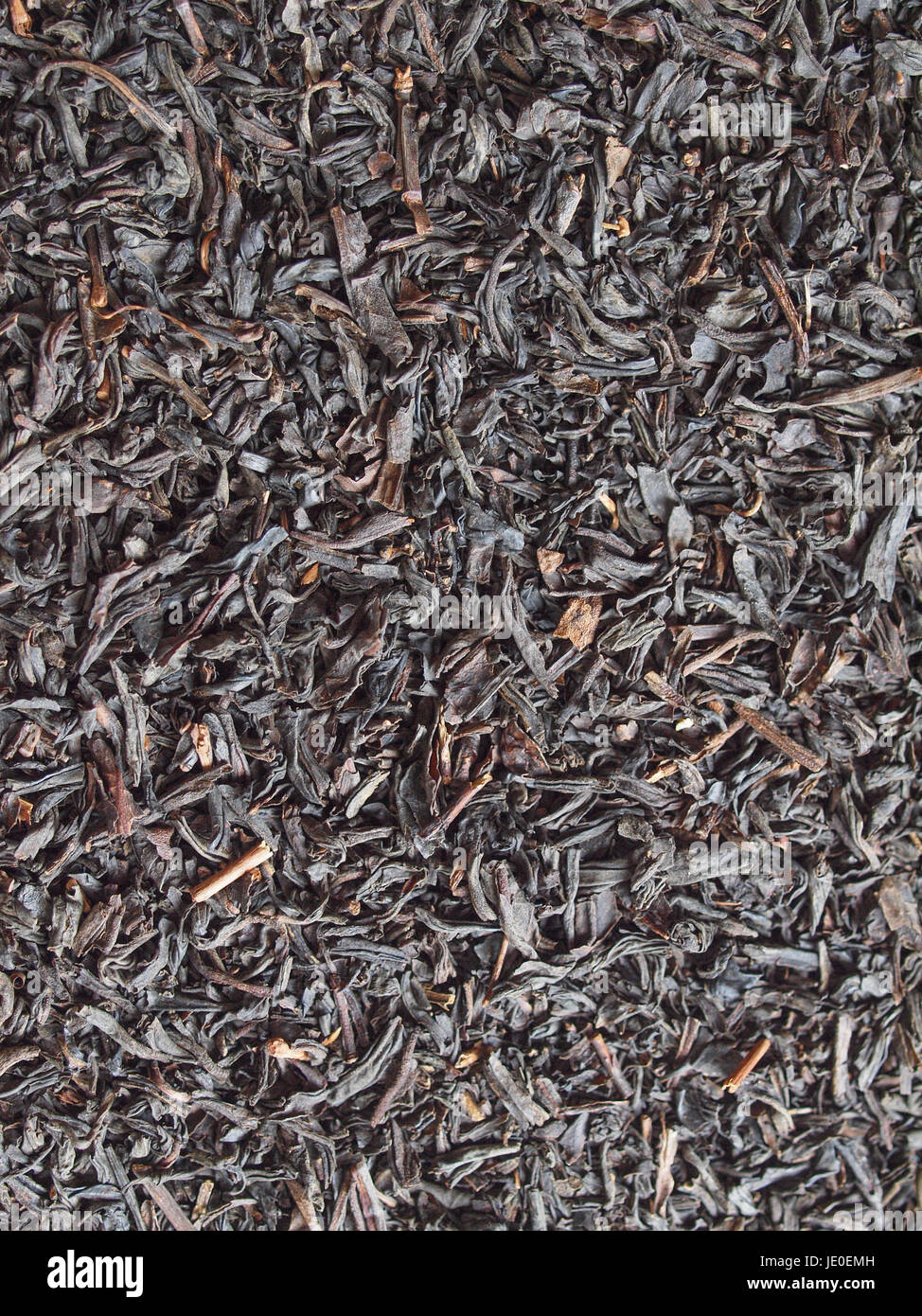 Loose tea leaves useful as a background Stock Photo - Alamy