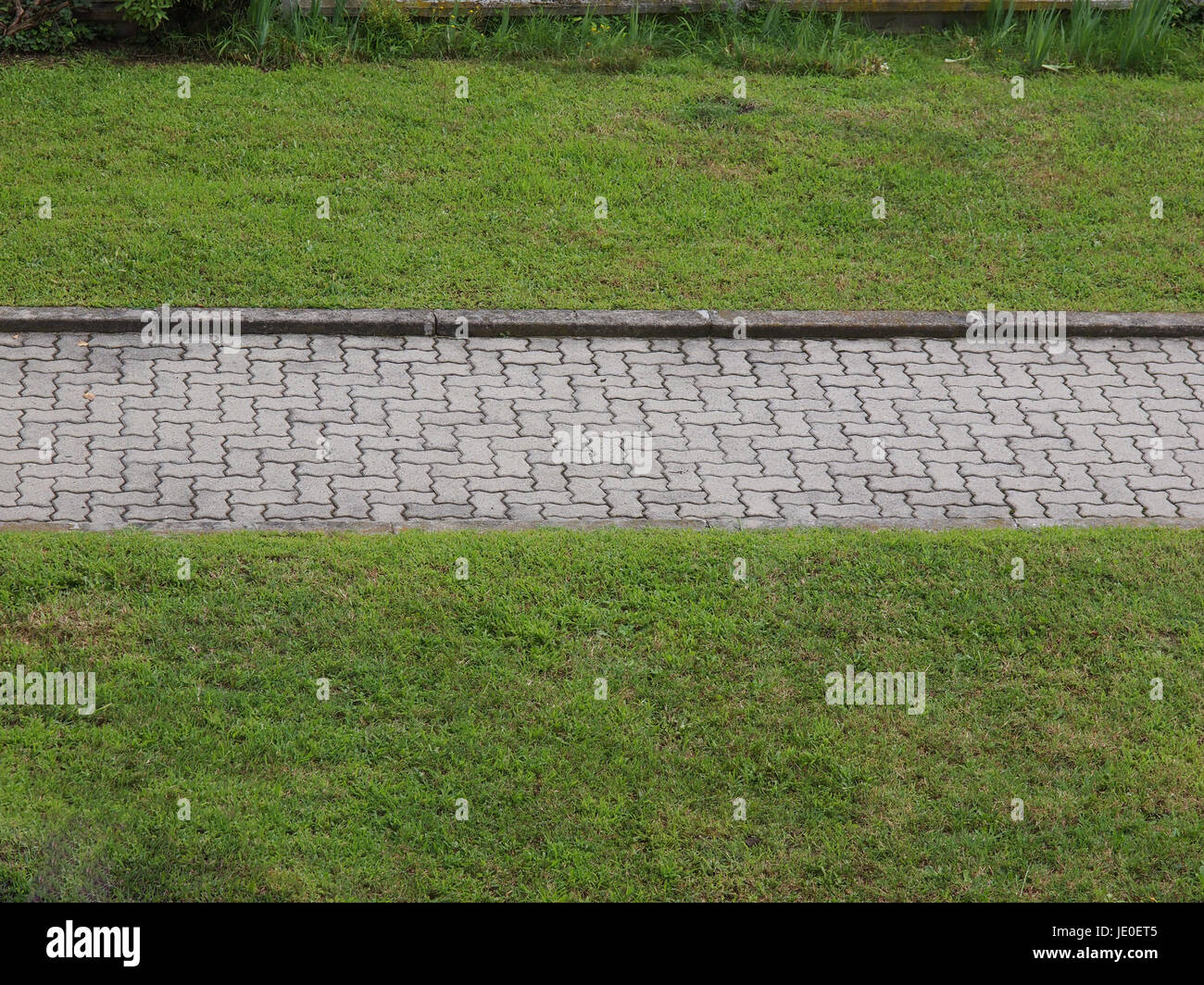 A concrete pavement sidewalk path for pedestrians Stock Photo - Alamy