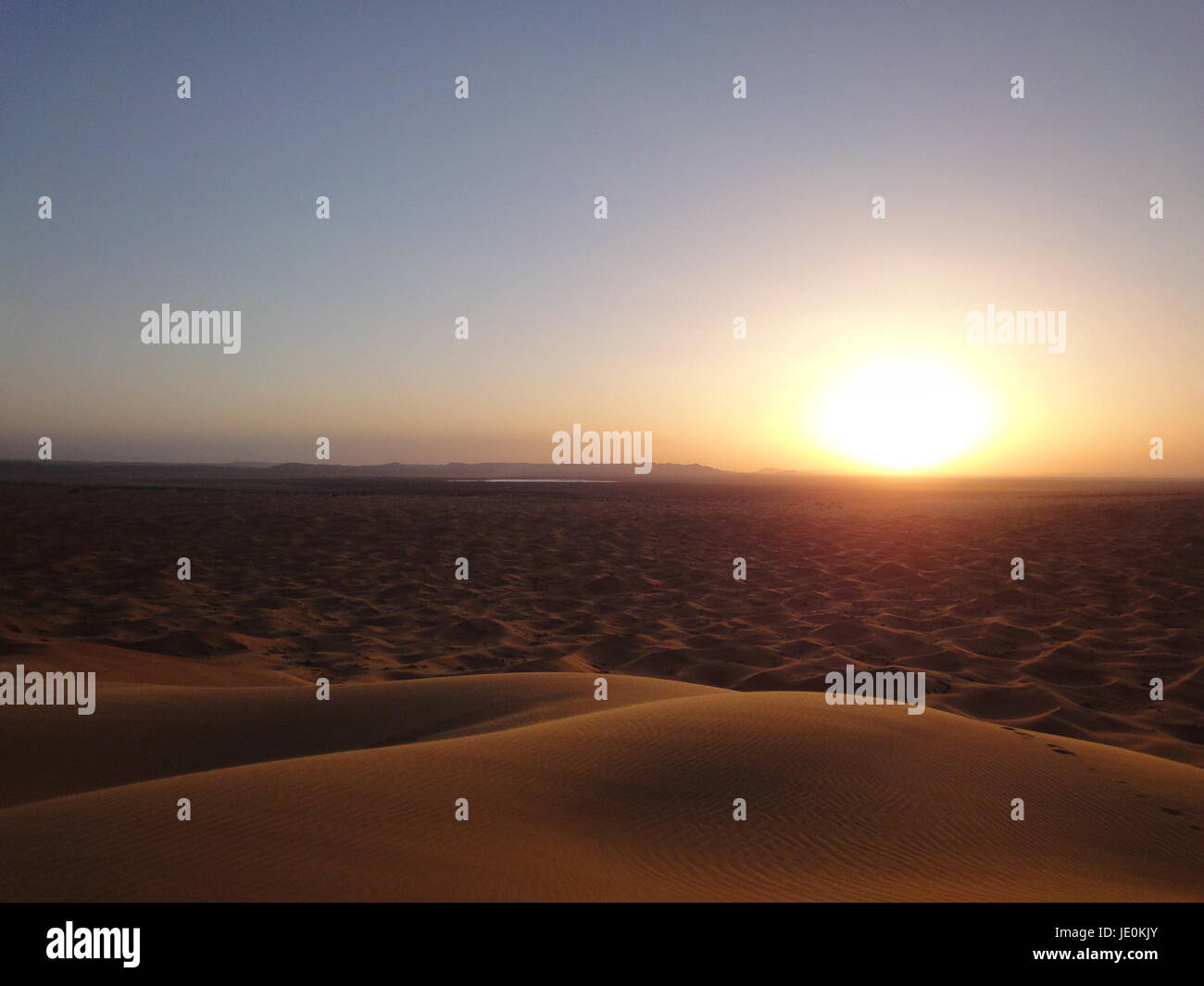 Sunset in the Moroccan Sahara Stock Photo - Alamy
