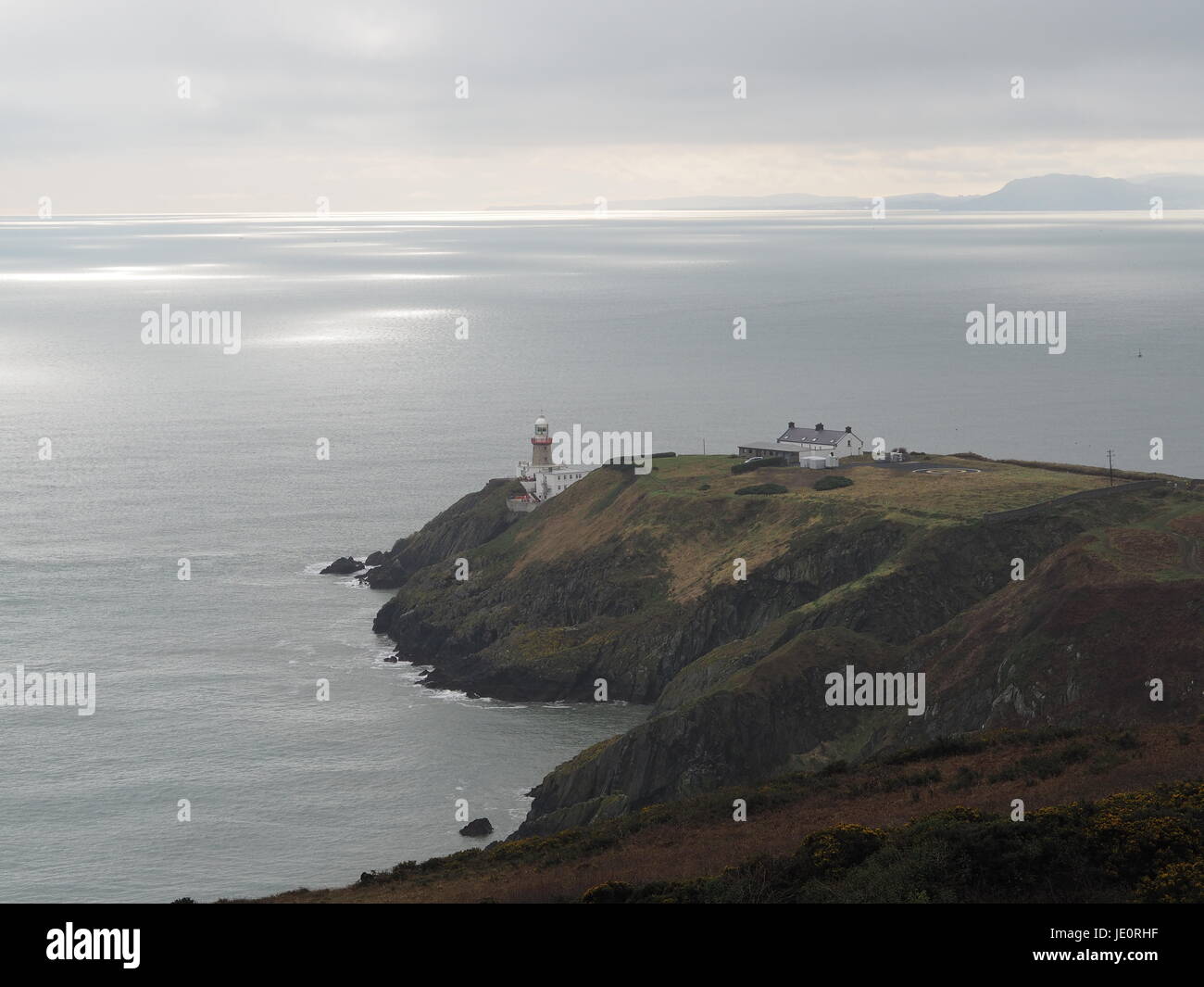 Lighthouse on a hill Stock Photo - Alamy