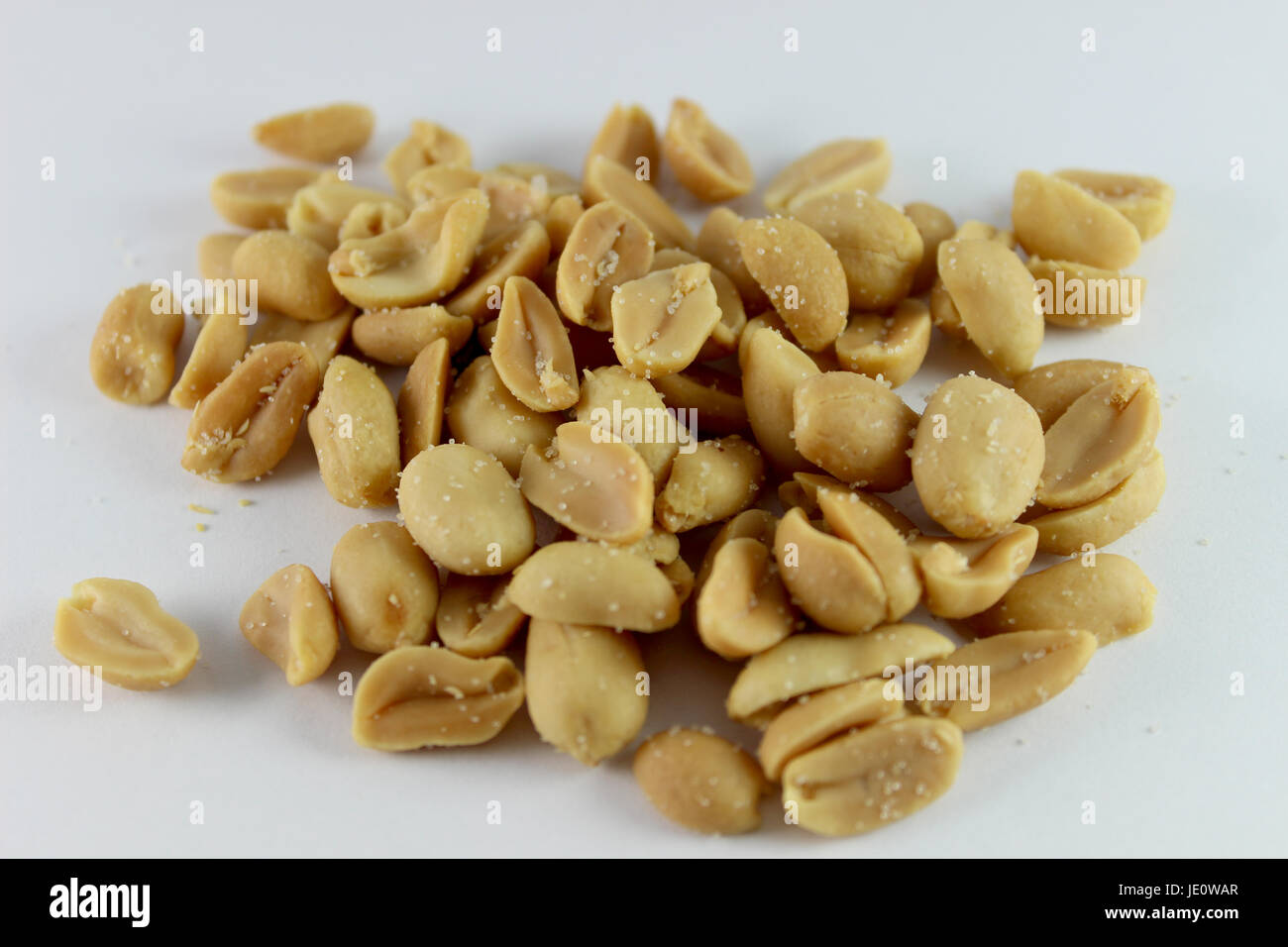 Arranged peanuts peeled and isolated on white background Stock Photo ...