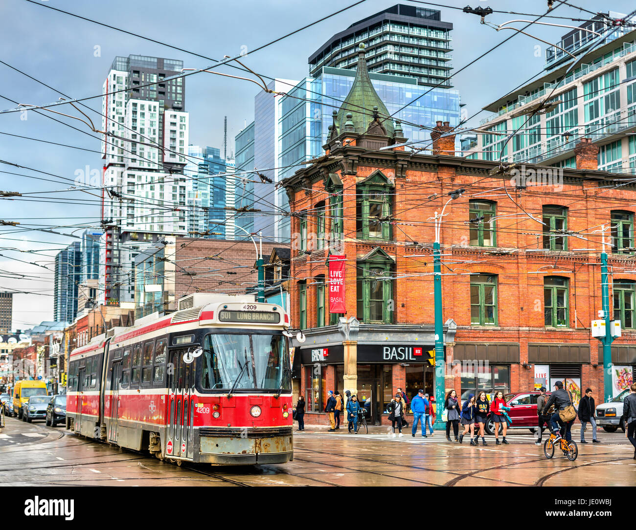 Old streetcar on a street of Toronto. The Toronto streetcar system is ...