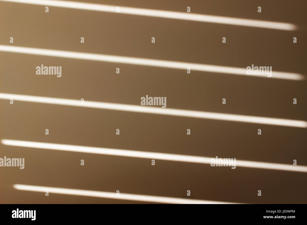 Sunlight from the window of the room on the wall close-up Stock Photo ...