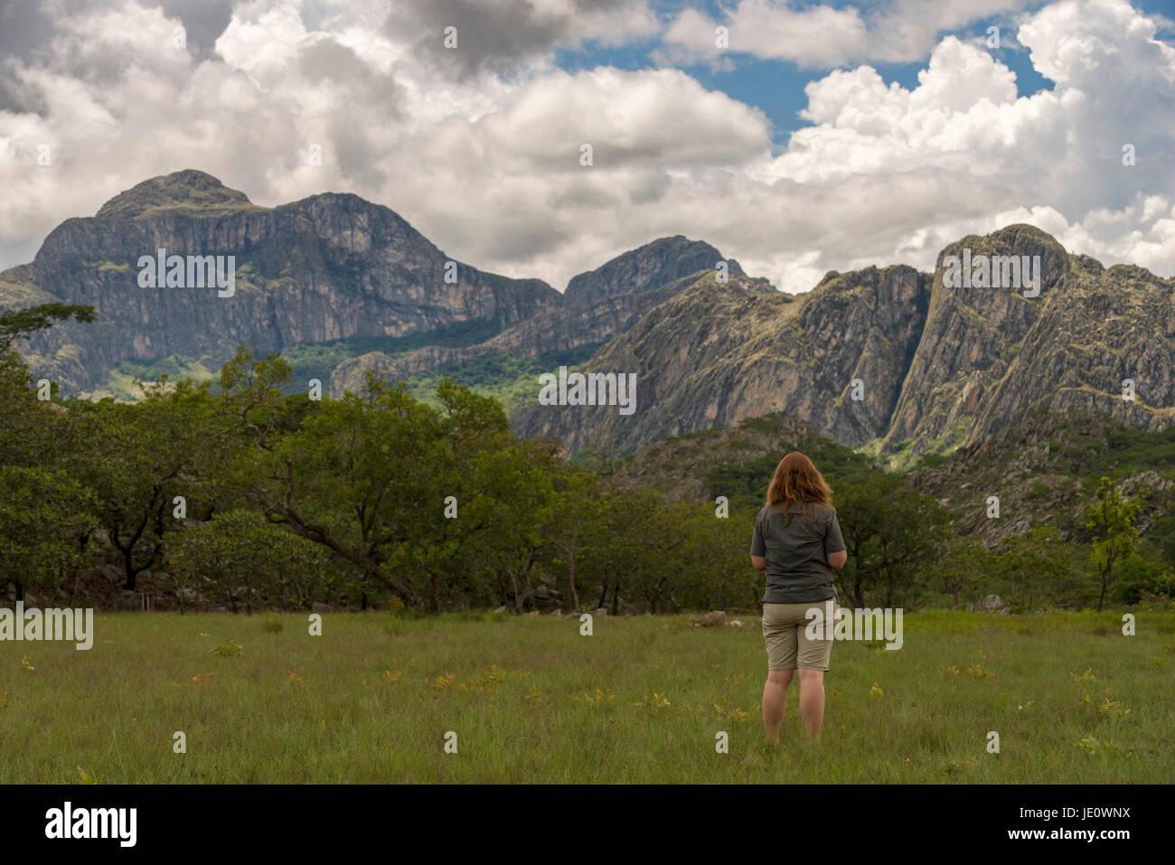 A tourist seen looking at the Chimanimani mountains in Zimbabwe Stock ...