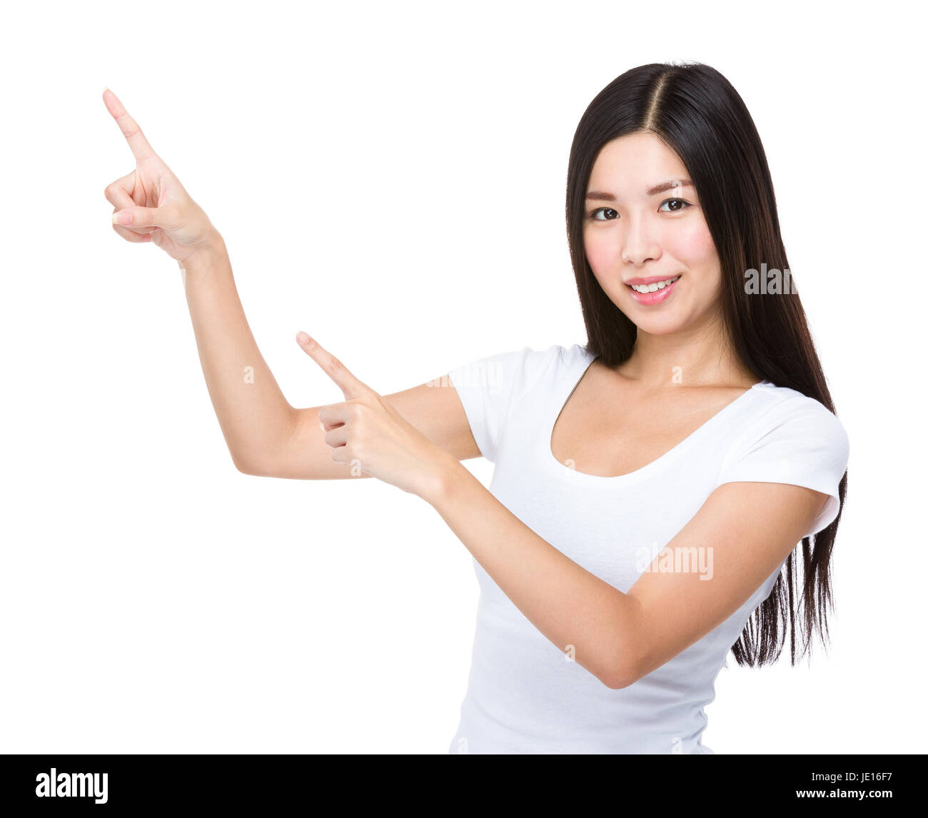 Woman with two finger point up Stock Photo - Alamy