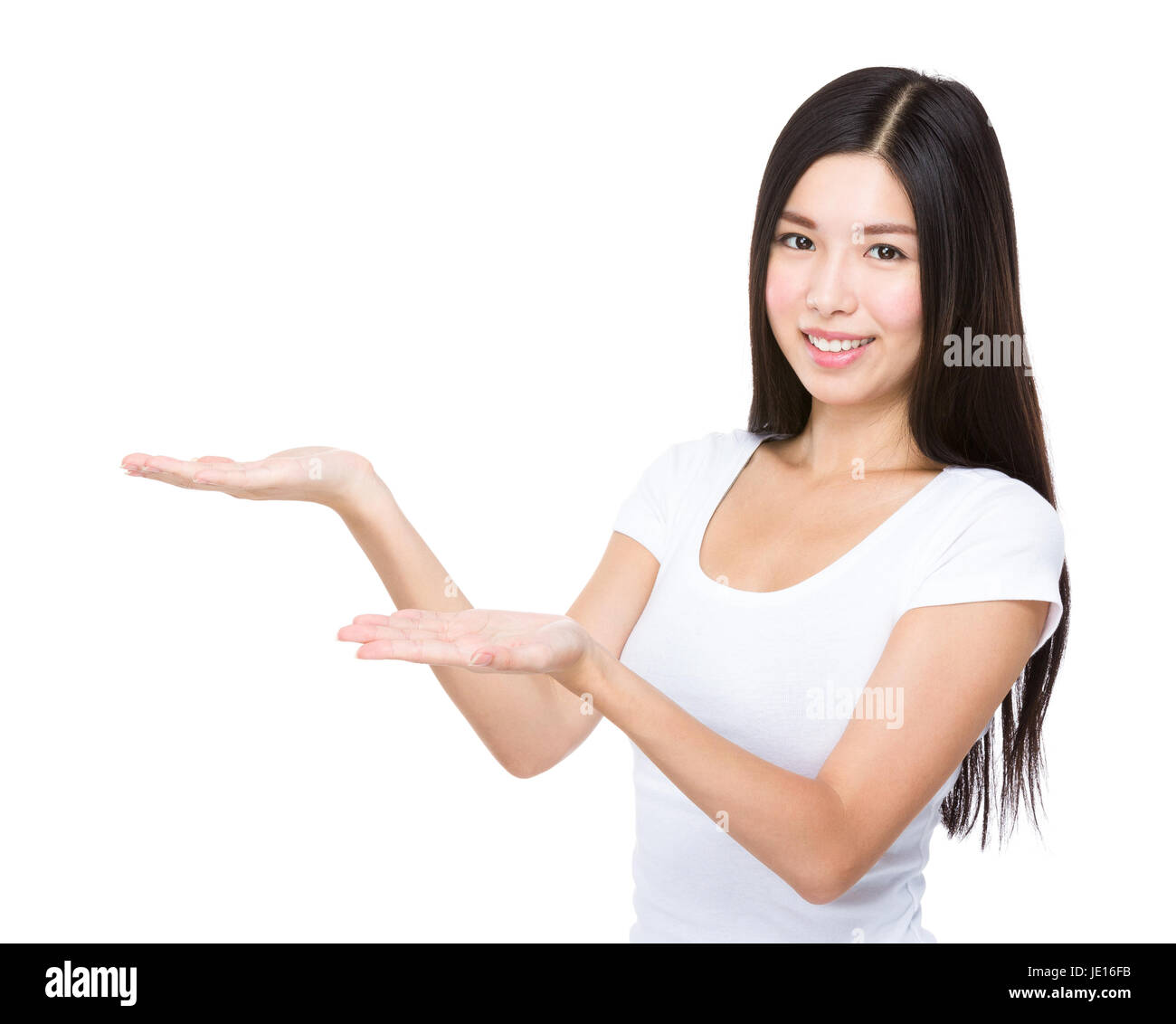 Woman with two hand presentation Stock Photo - Alamy