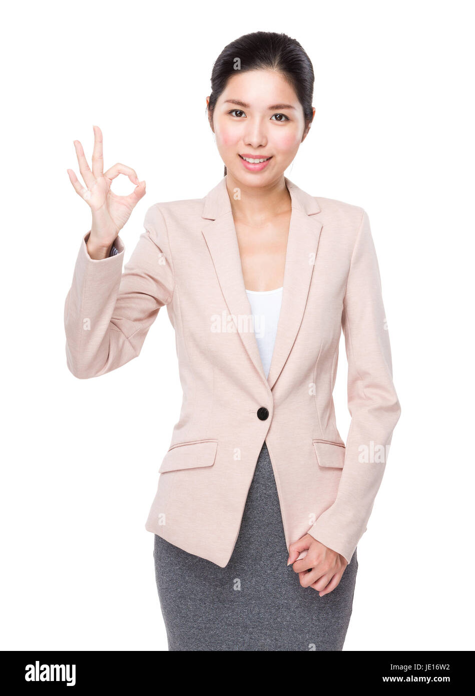 Business woman with ok sign Stock Photo - Alamy