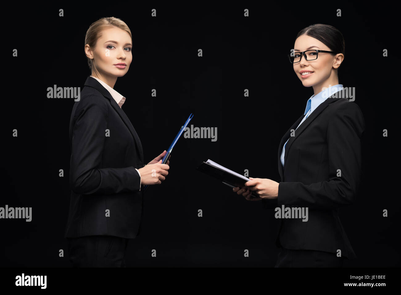 business people connecting during work and using clipboards, business ...