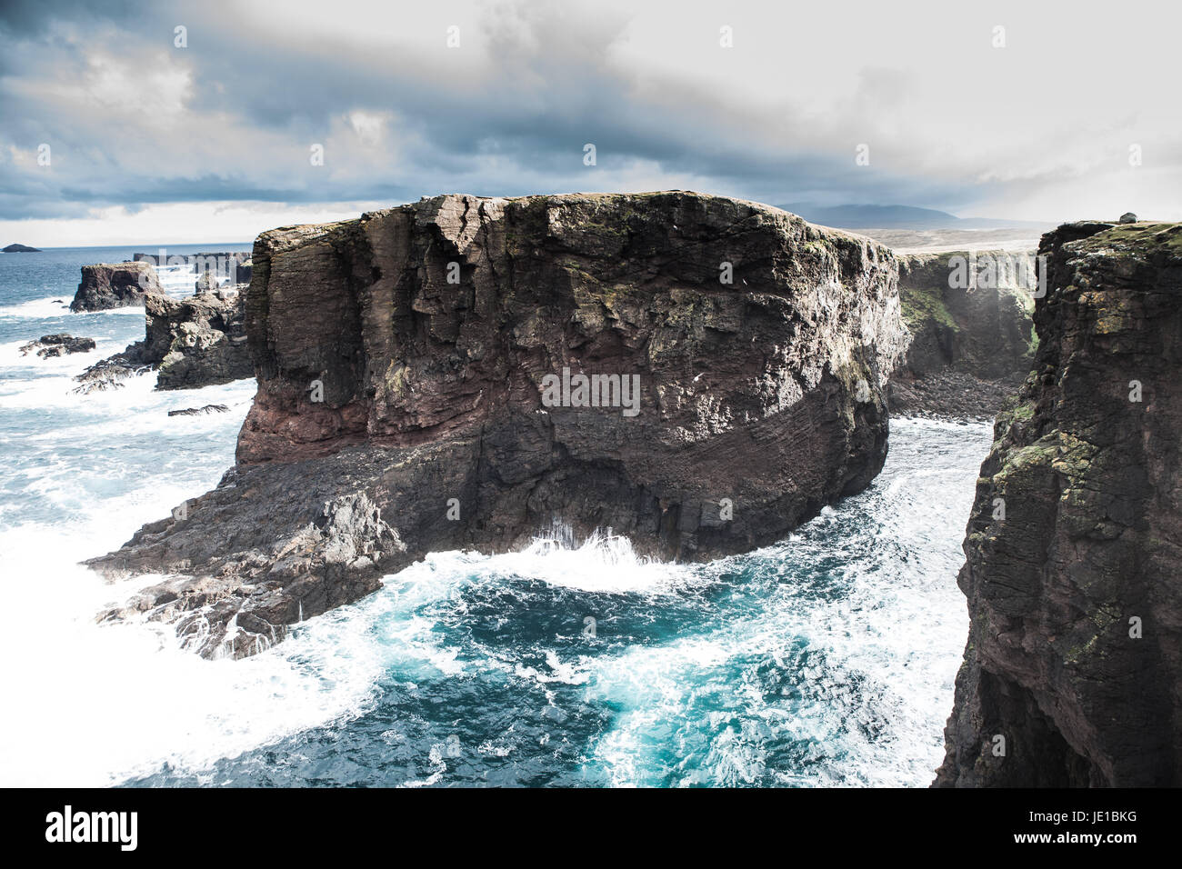 Waves crashing over the cliffs, Shetland Islands, United Kingdom Stock ...
