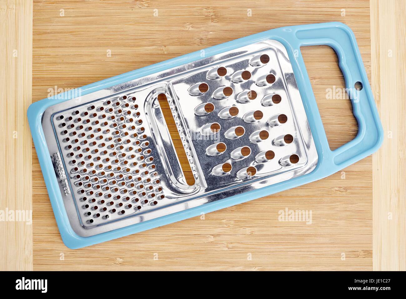 A studio photo of a kitchen grater Stock Photo - Alamy