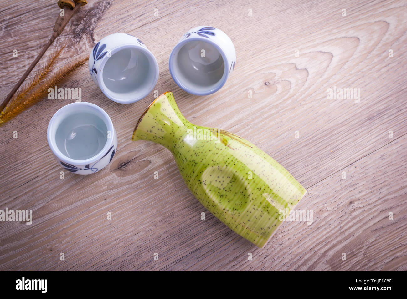 Japanese Sake drinking set on old wood texture background Stock Photo ...