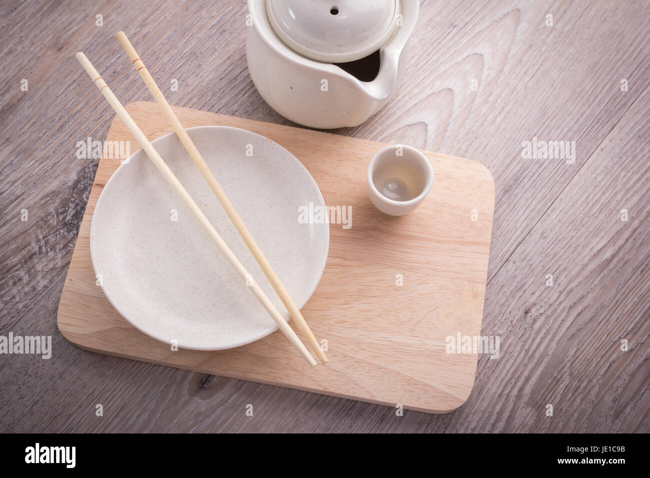 empty tea drinking set on old wood texture background Stock Photo - Alamy