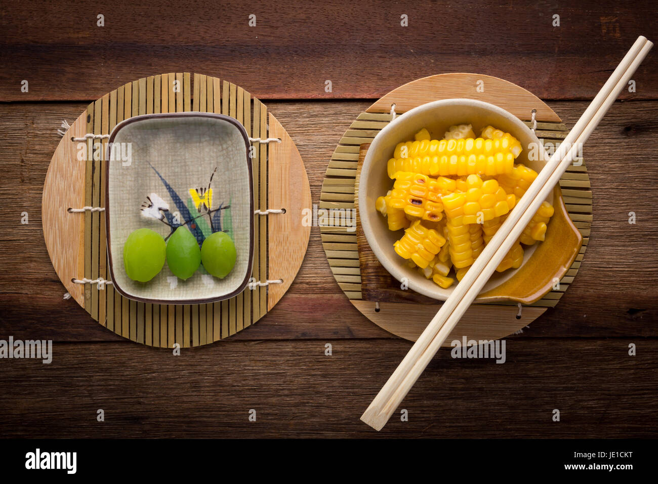 split corn on wood background, View from above with copy space Stock ...