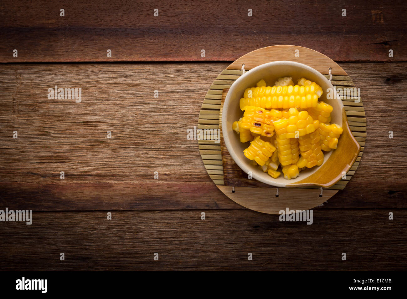 split corn on wood background, View from above with copy space Stock ...