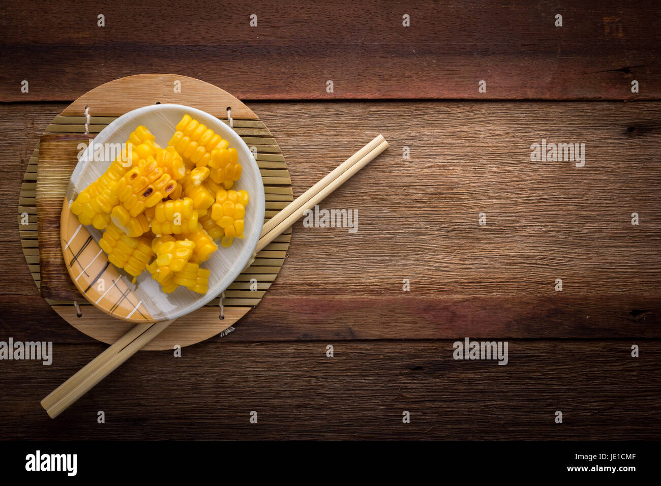 split corn on wood background, View from above with copy space Stock ...