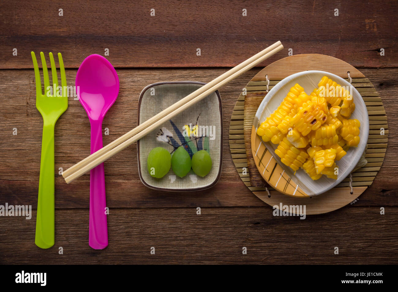 split corn on wood background, View from above with copy space Stock ...