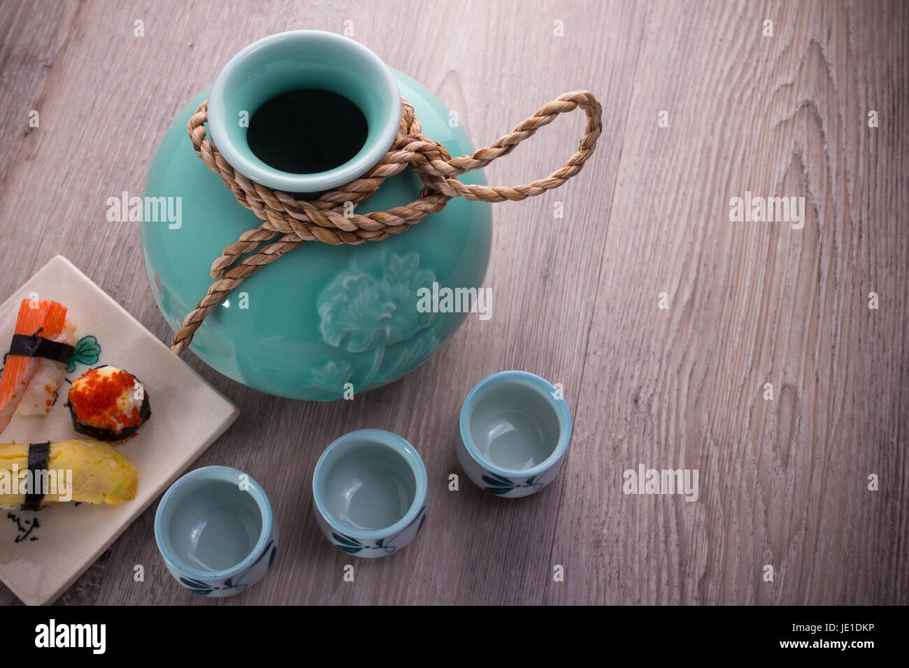 japan sake bottle set on wood background Stock Photo - Alamy